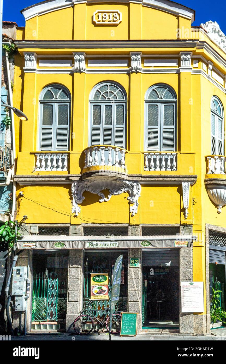 Facade of old traditional buildings surrounding the Plaza Maua in Rio ...