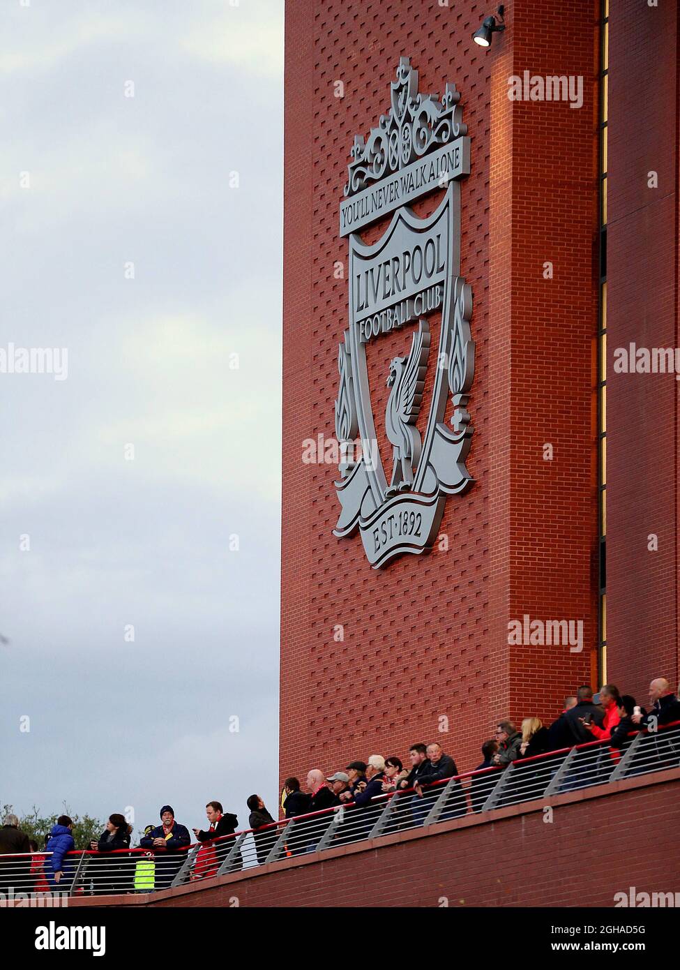 Liverpool fans wait on the balcony before the Premier League match at ...
