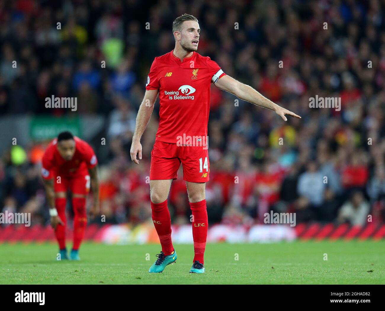 Jordan Henderson of Liverpool points during the Premier League match at ...