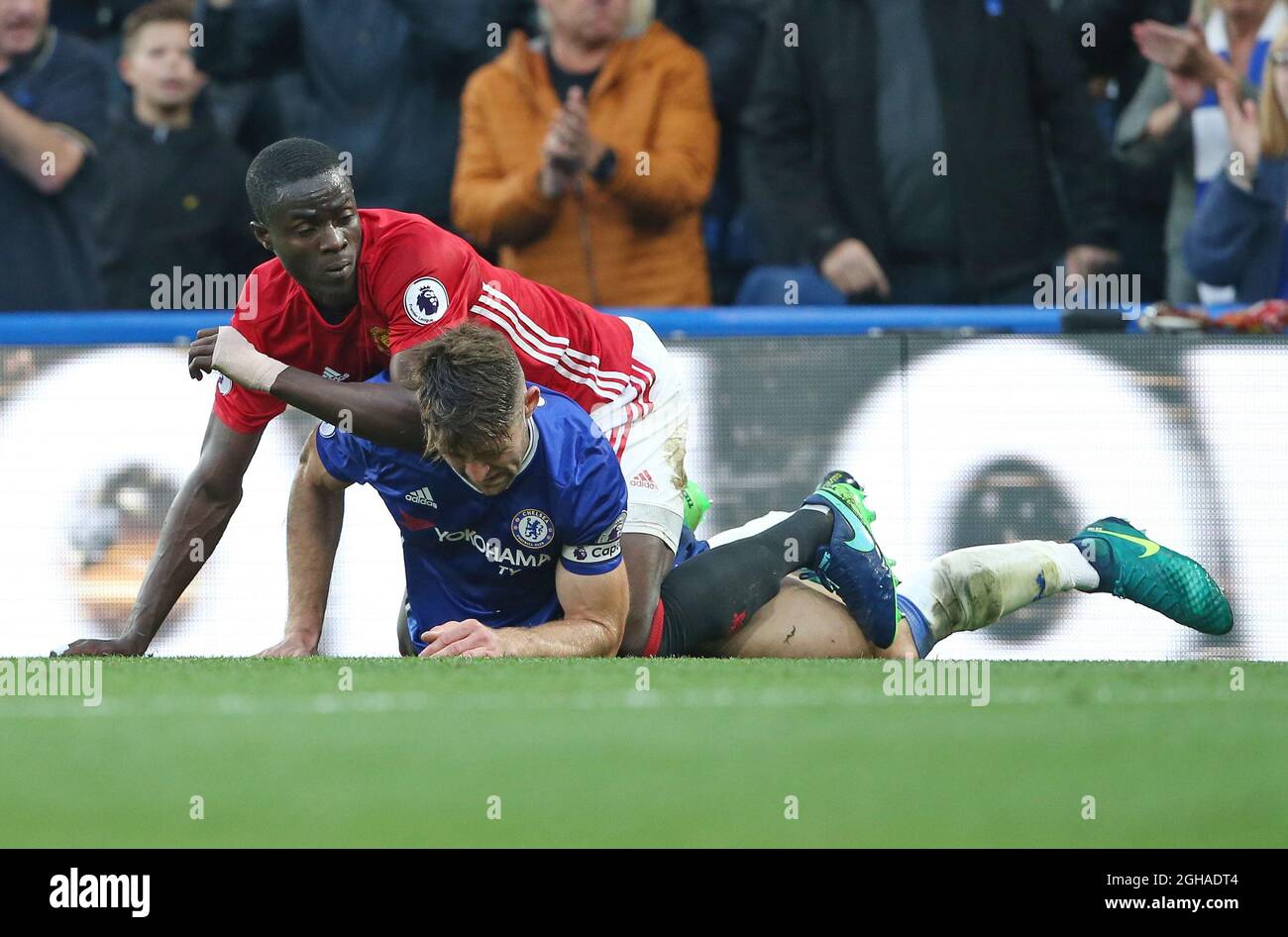 Chelsea's Gary Cahill tussles with Manchester United's Eric Bailly ...