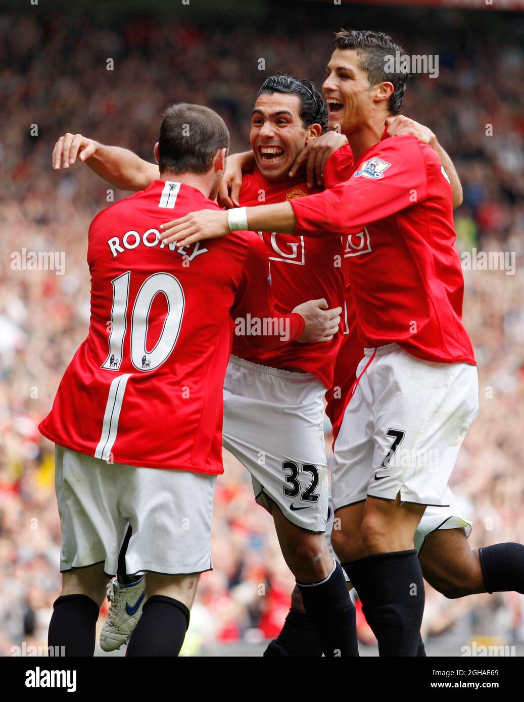 Manchester United's Carlos Tevez (centre) celebrates his goal with ...