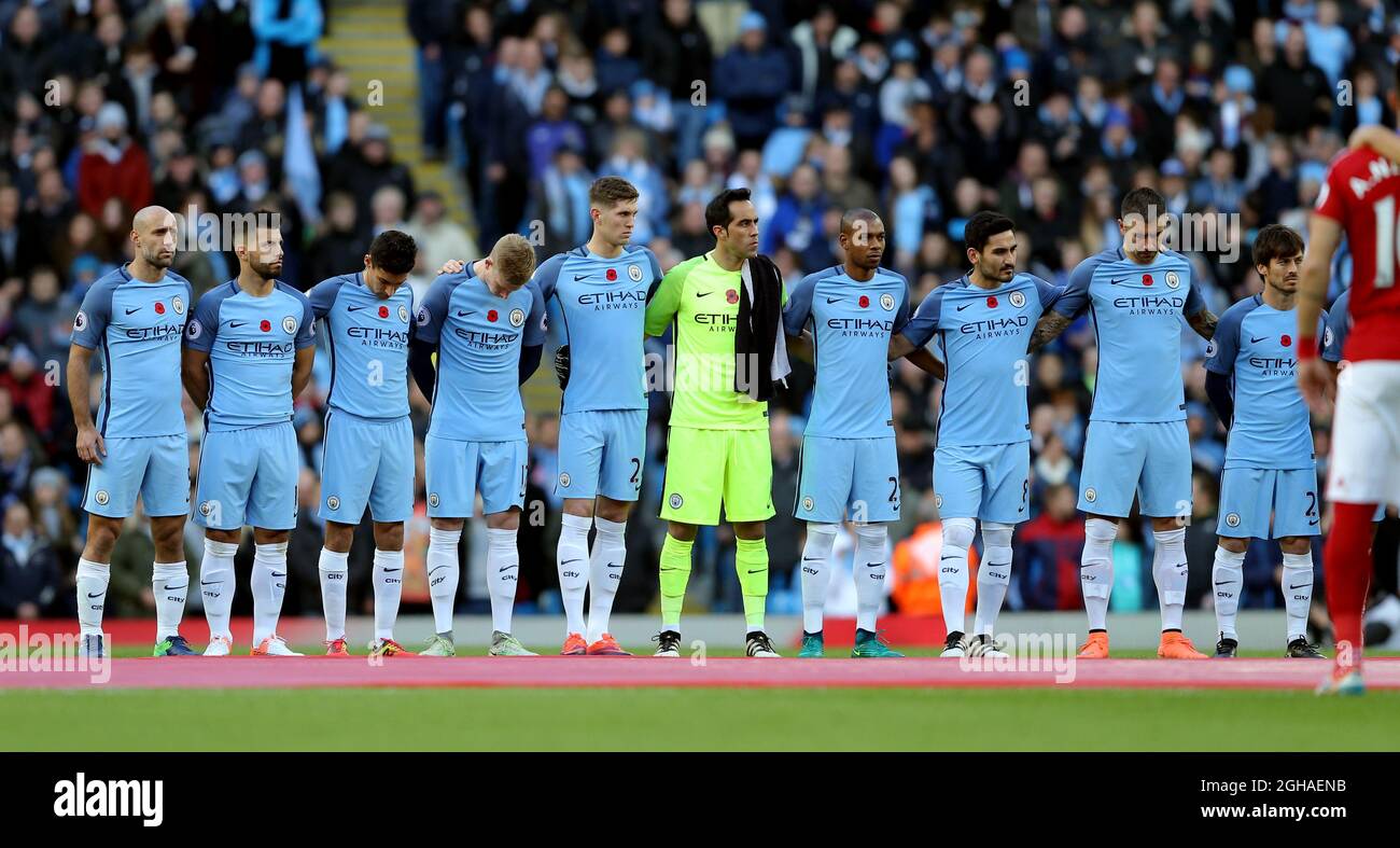 Manchester City players line up for a remembrance day event during the ...