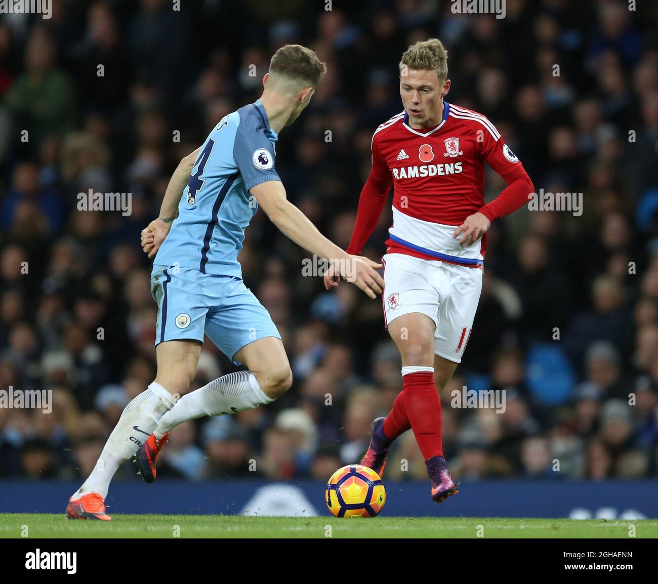 Viktor Fischer of Middlesbrough takes on John Stones of Manchester City ...
