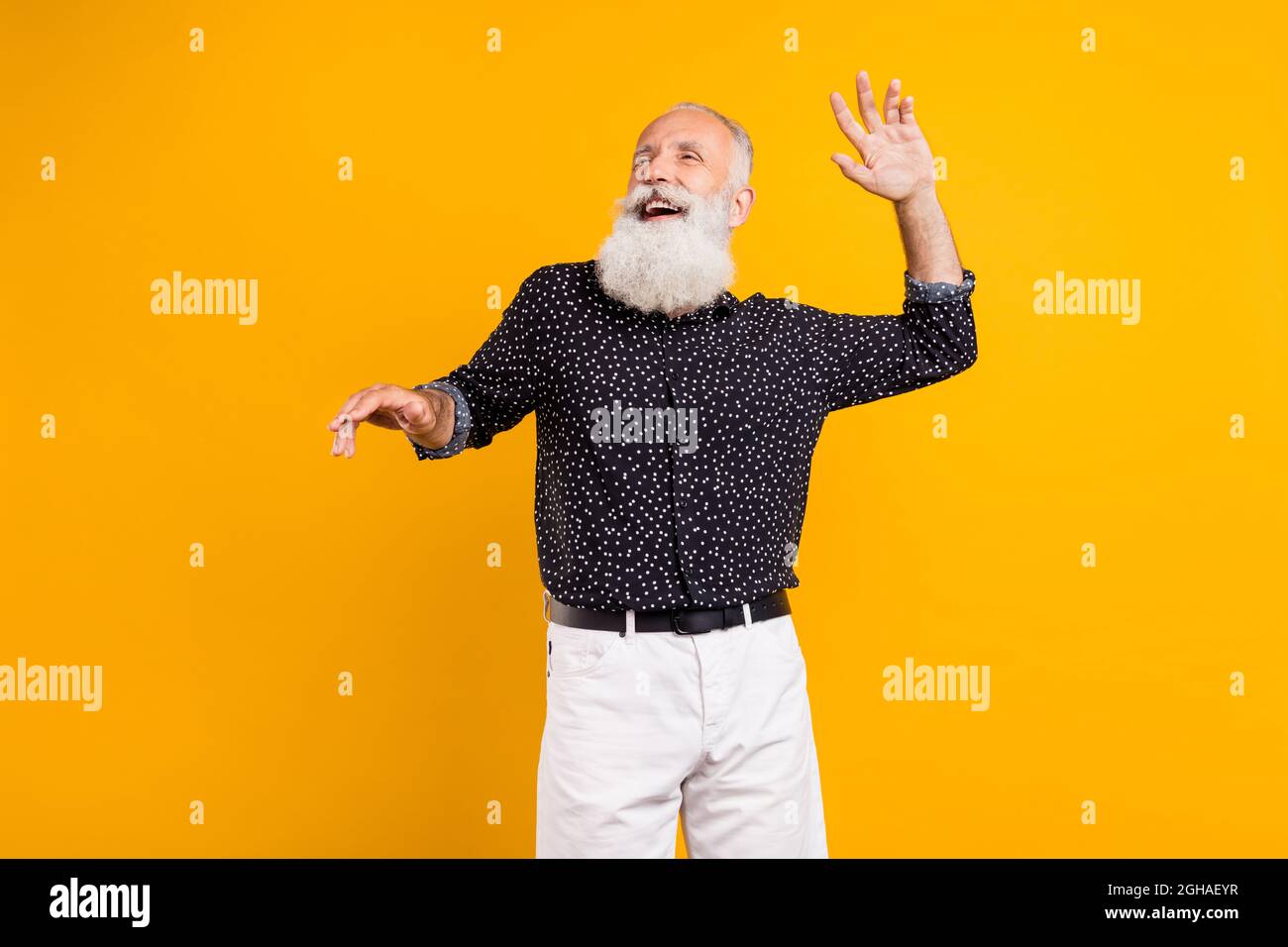 Photo of old happy positive cheerful man look empty space dance enjoy ...