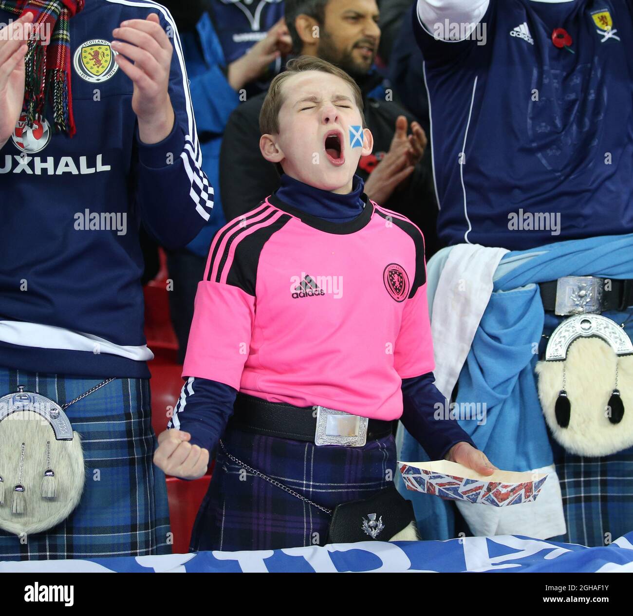 A young Scotland fan sings his anthem during the FIFA World Cup ...