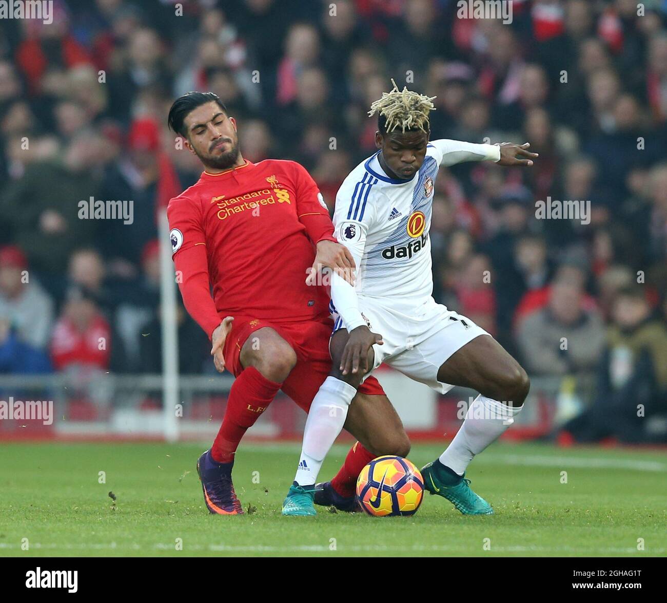 Emre Can of Liverpool tackles Didier Ndong of Sunderland during the ...