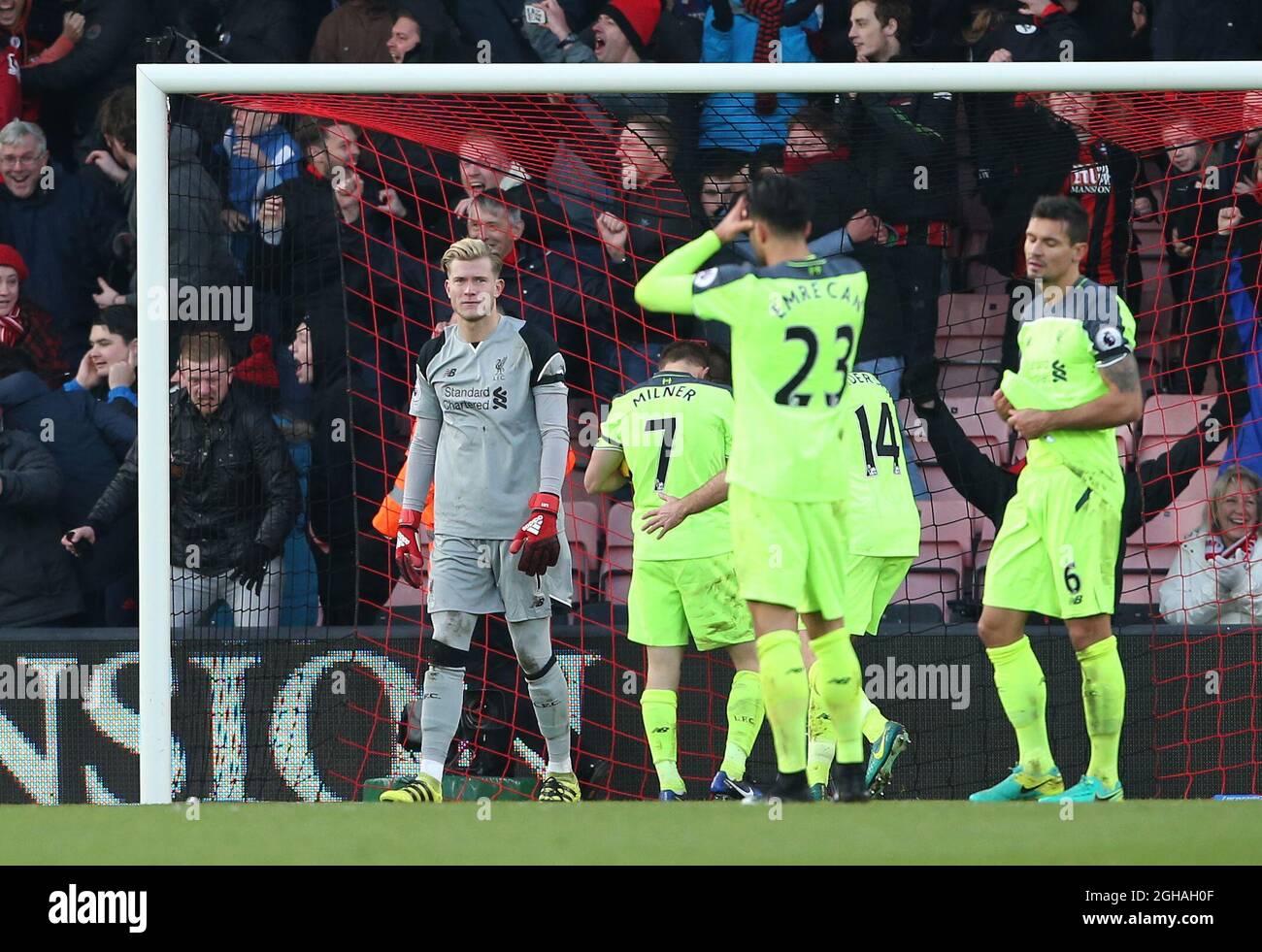 Liverpool's Loris Karius looks on dejected after his mistake gives ...
