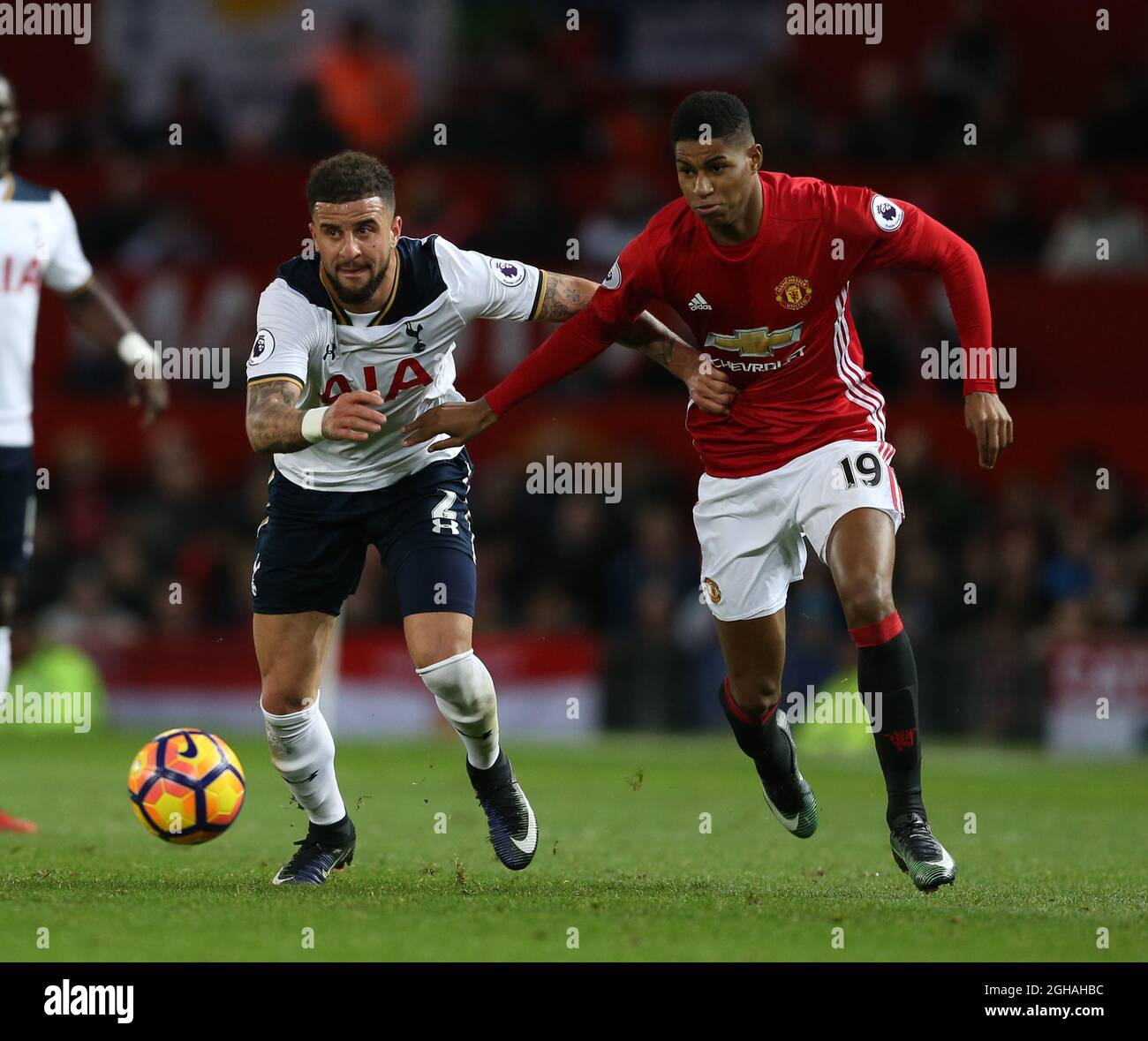 Kyle Walker of Tottenham tussles with Marcus Rashford of Manchester ...