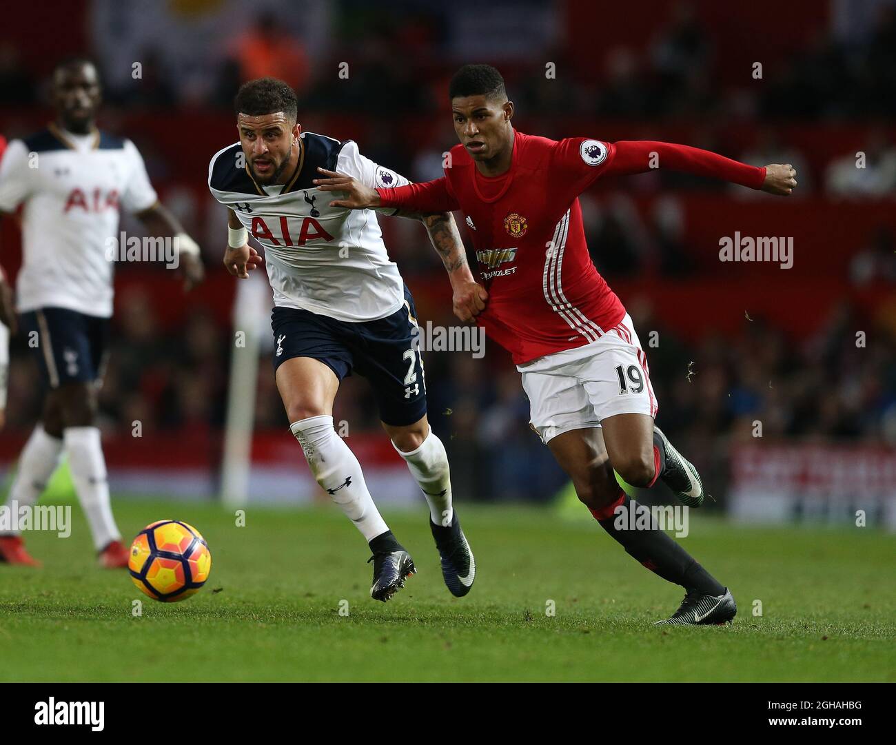Kyle Walker of Tottenham tussles with Marcus Rashford of Manchester ...