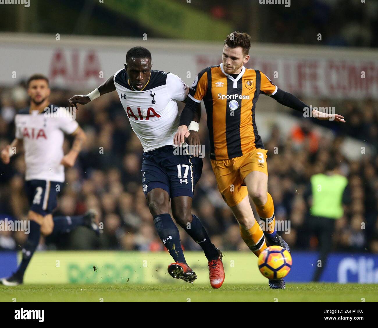 Tottenham's Moussa Sissoko tussles with Hull's Andrew Robertson during ...
