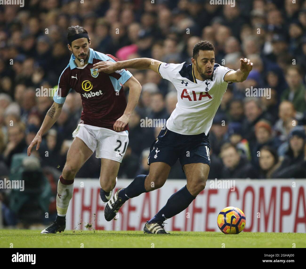 Tottenham's Mousa Dembele tussles with Burnley's George Boyd during the ...