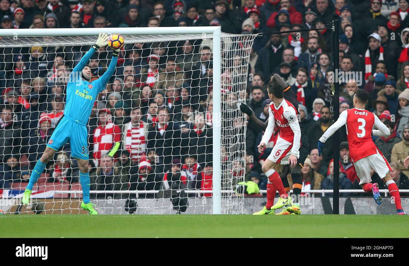Arsenal's Petr Cech saves from Hull City's Alfred NÕDiaye during the ...