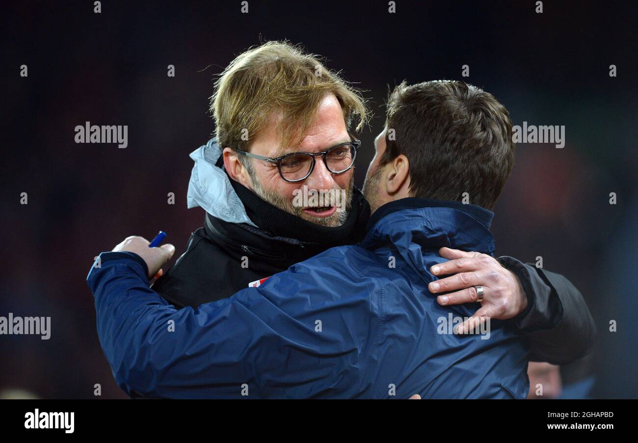 Liverpool Manager Jurgen Klopp hugs Tottenham Hotspur Manager Mauricio Pochettino during the ...