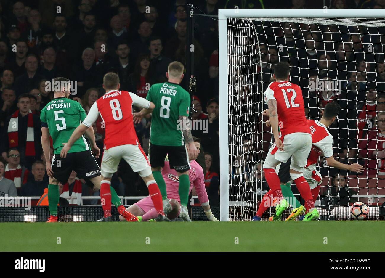 Lincoln's Luke Waterfall scoring an own goal to put Arsenal 3-0 up ...