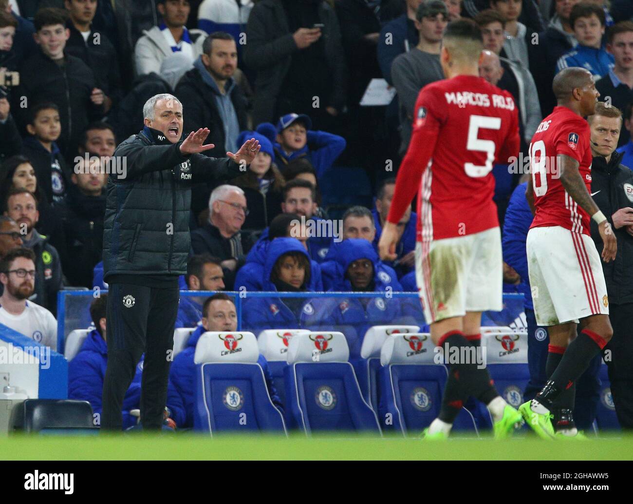 Manchester United's Jose Mourinho tries to calm his players during the ...