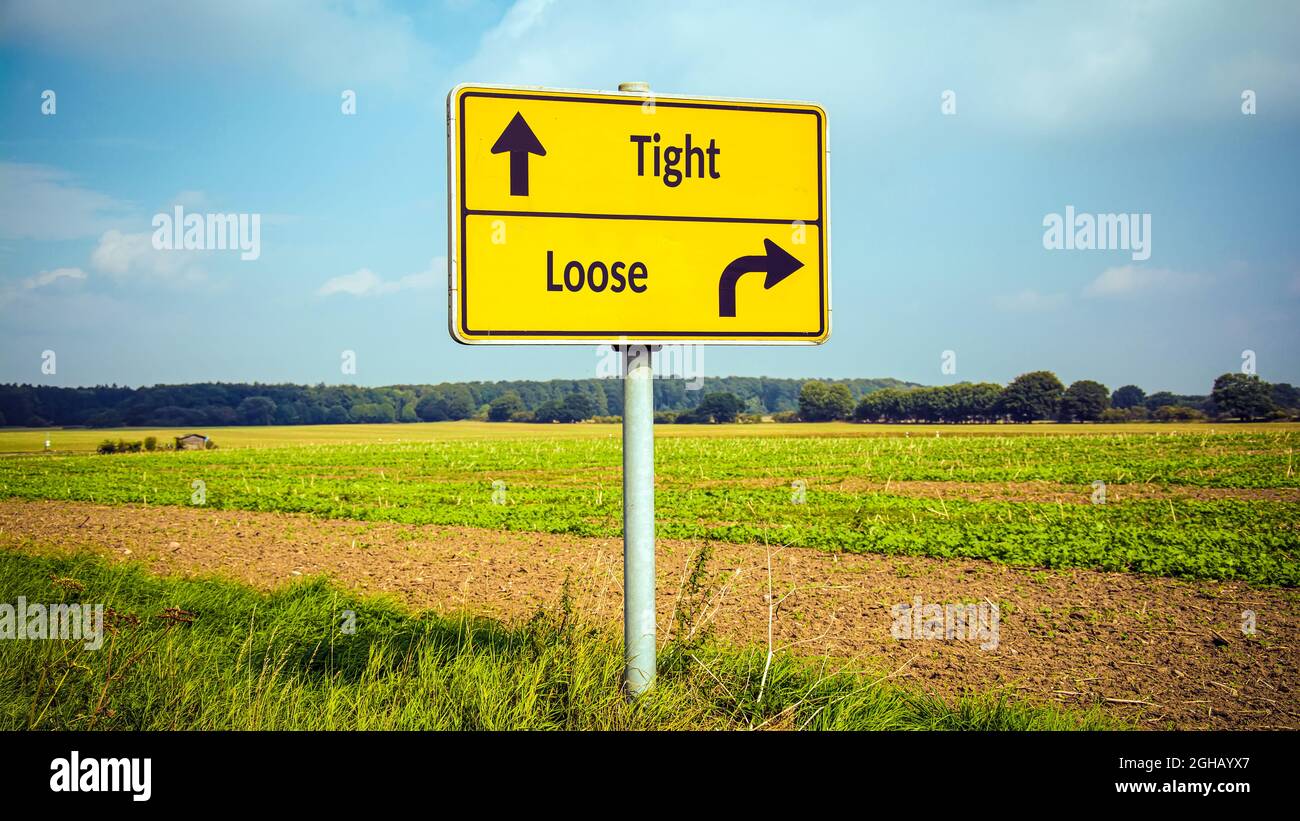 Street Sign the Direction Way to Tight versus Loose Stock Photo - Alamy