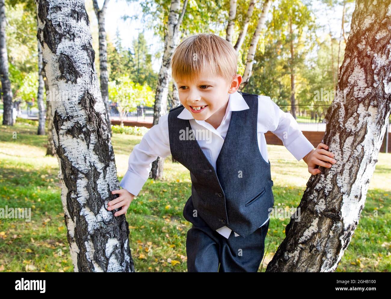 Happy Kid playing in the Summer Park Stock Photo - Alamy
