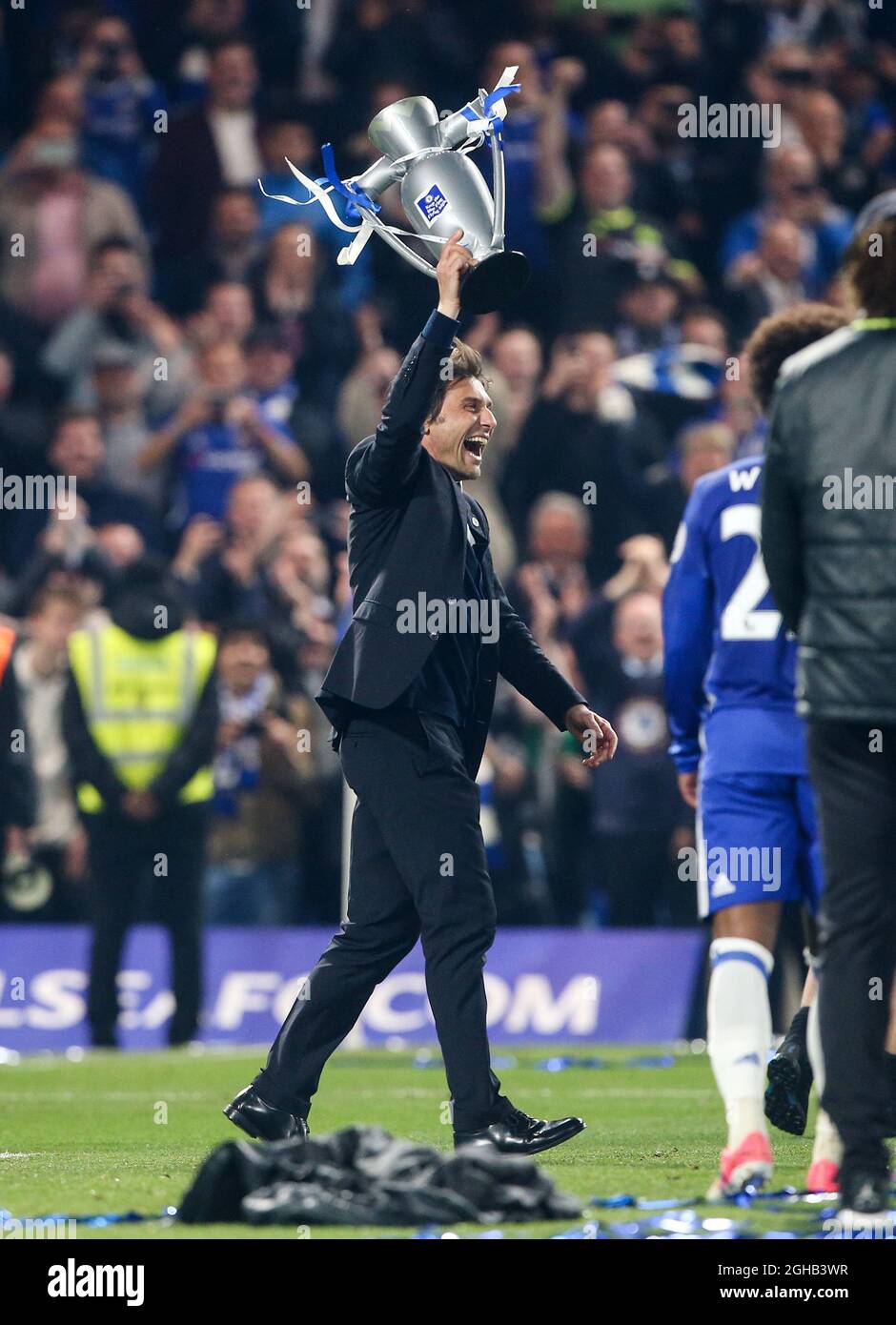 Chelsea's Antonio Conte celebrates with an inflatable trophy during the ...