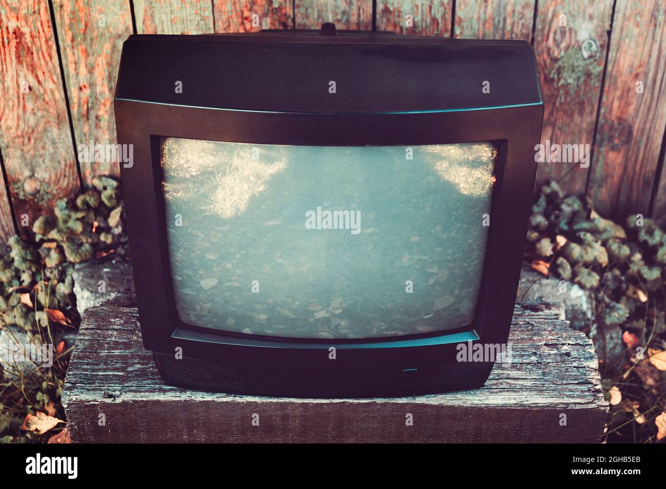 Old Analog Television Set on the Weathered Wooden Planks Background ...