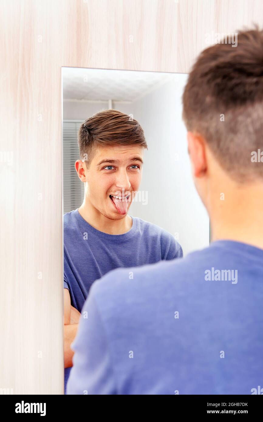 Male self portrait in a mirror hi-res stock photography and images - Alamy