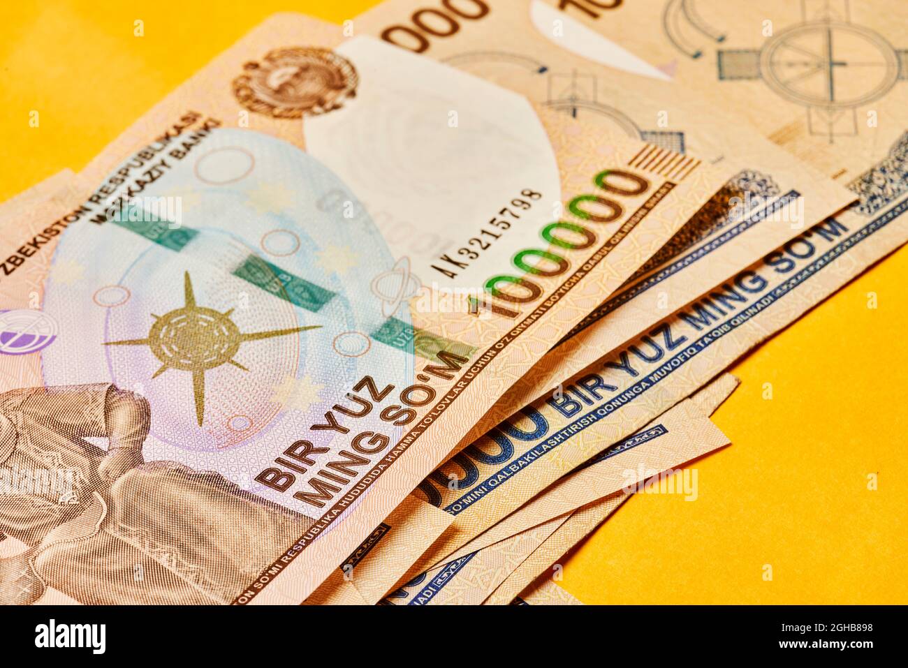 Macro shot of uzbek sum banknote. Pile of Uzbek sums. Uzbek currency ...