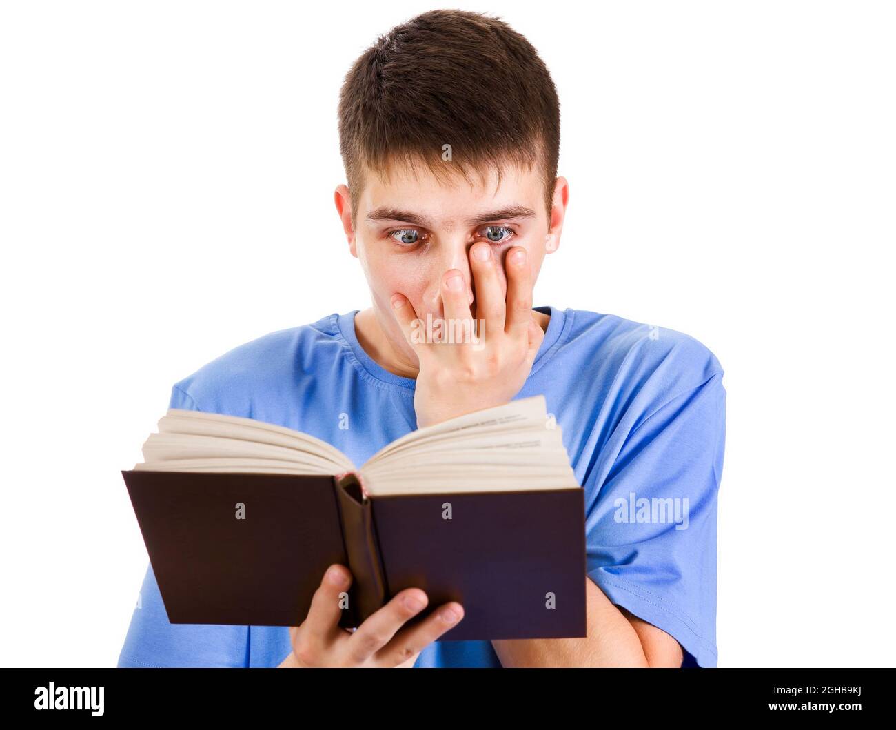 Shocked Young Man read a Book Isolated on the White Background Stock ...