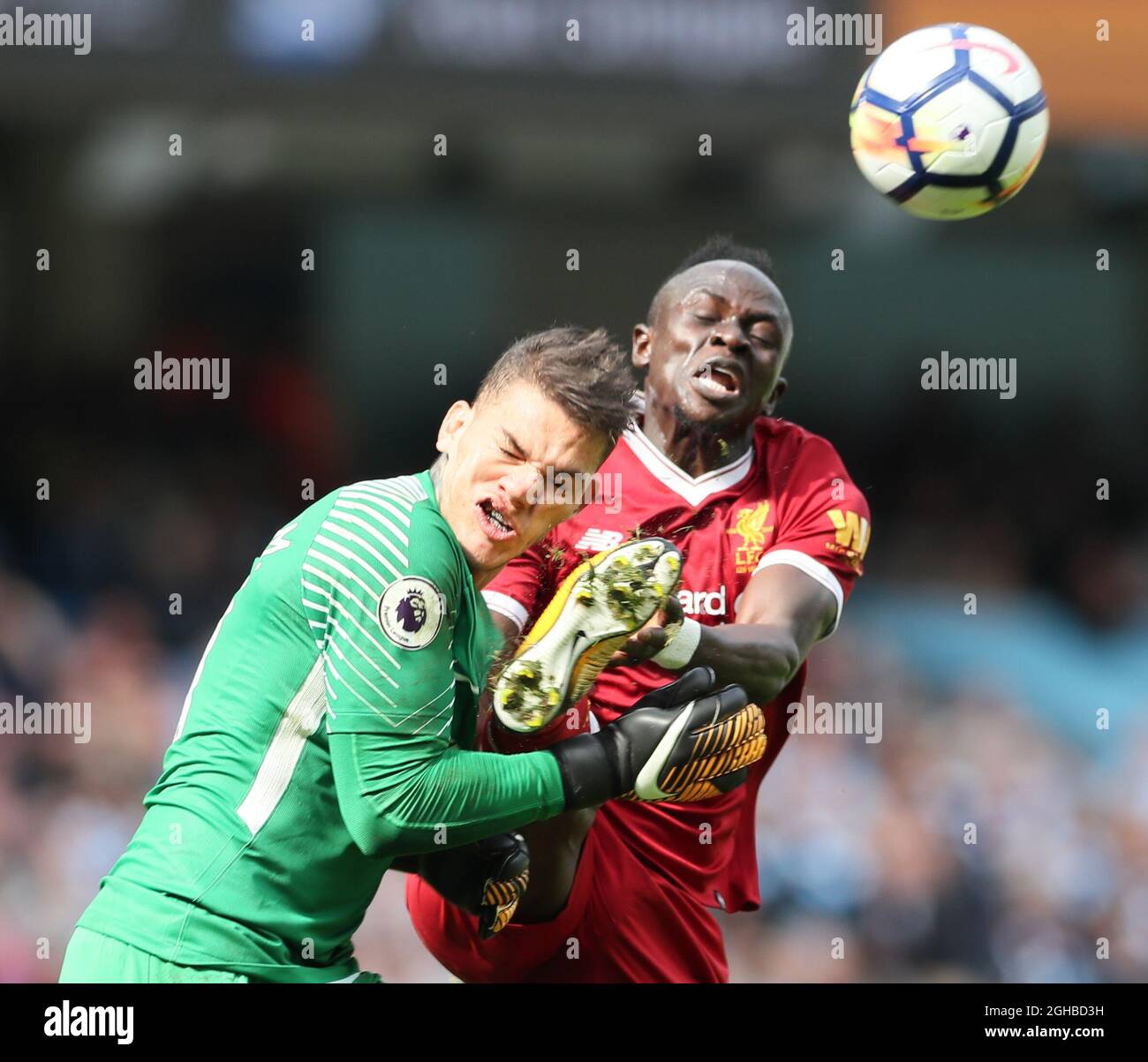 Ederson of Manchester City collides with Sadio Mane of Liverpool ...