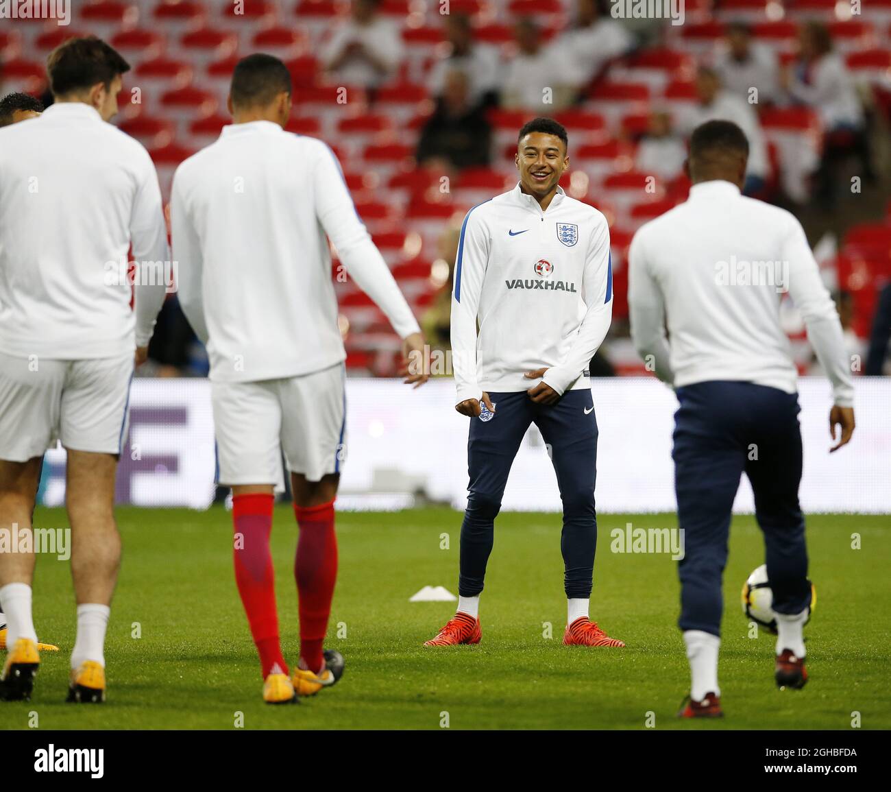 England's Jesse Lingard warms up during the world cup qualifying match ...