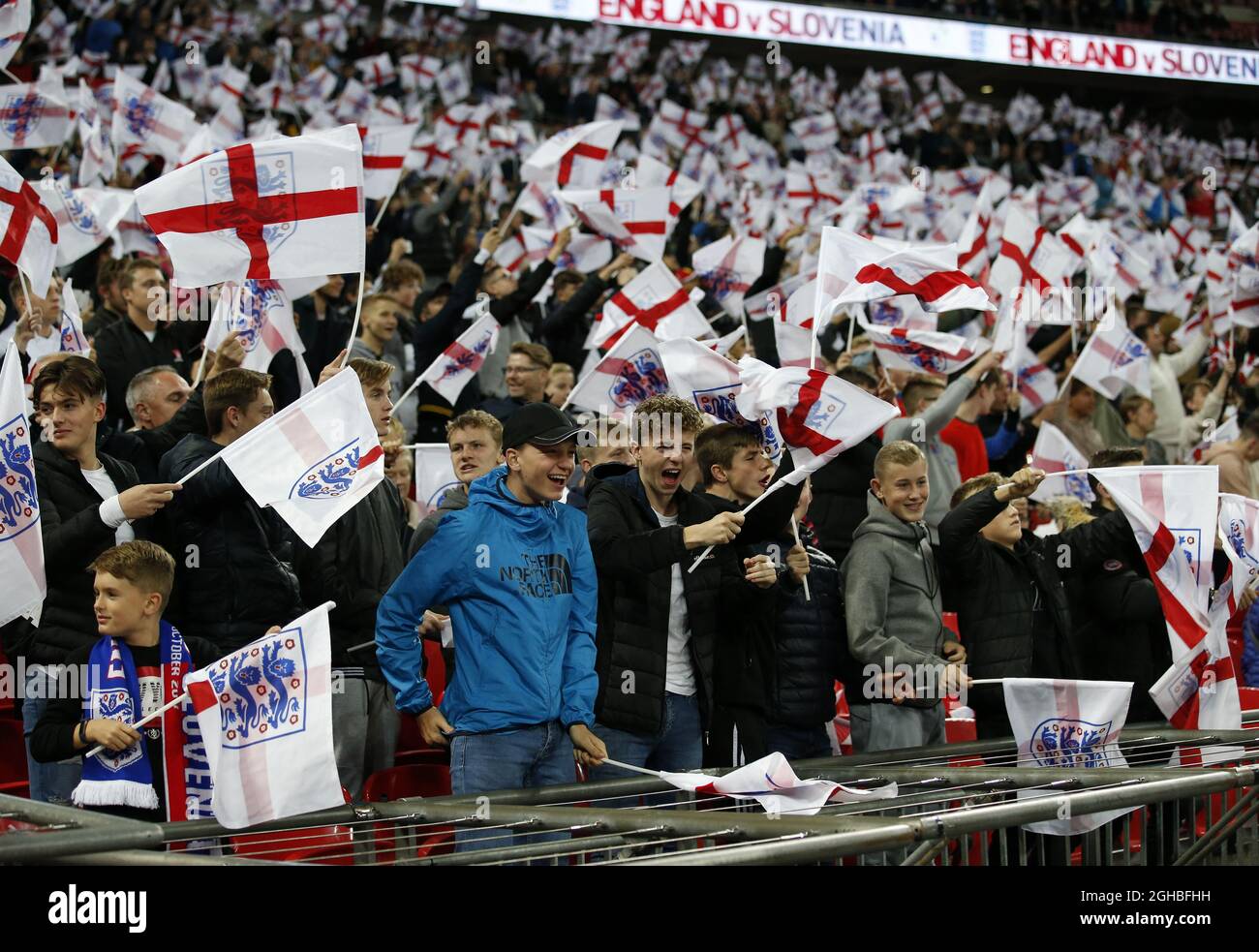 England's fans waves their flags during the world cup qualifying match ...