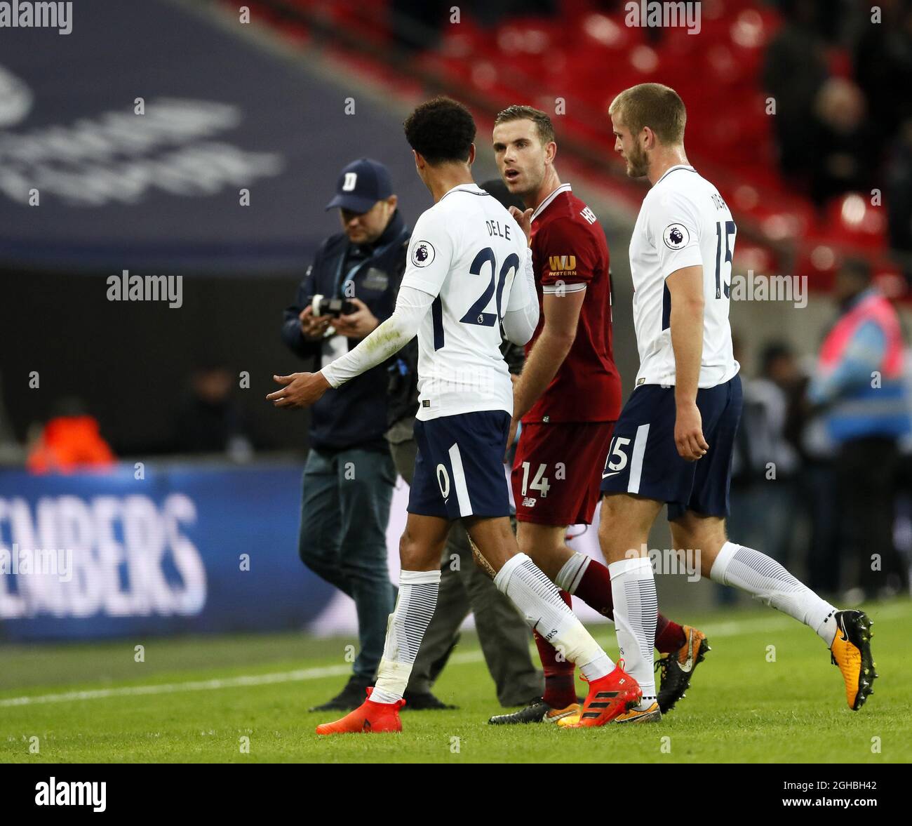 Tottenham's Dele Alli and Liverpool's Jordan Henderson argue at the ...