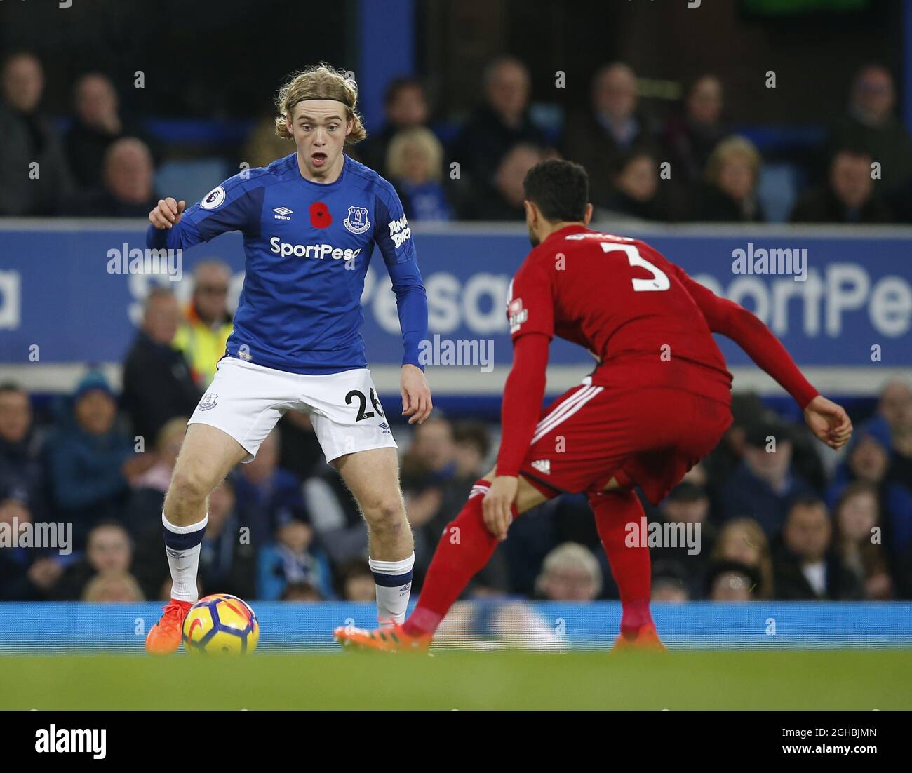 Tom Davies of Everton in action with Miguel Angel Britos of Watford ...