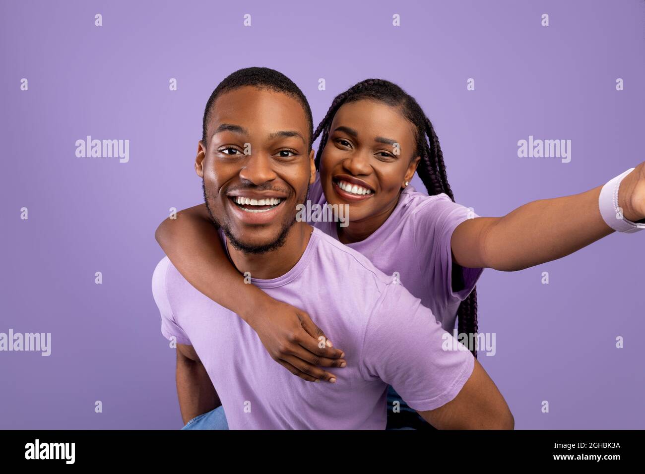 Black african american couple man woman looking at smartphone photo hi ...