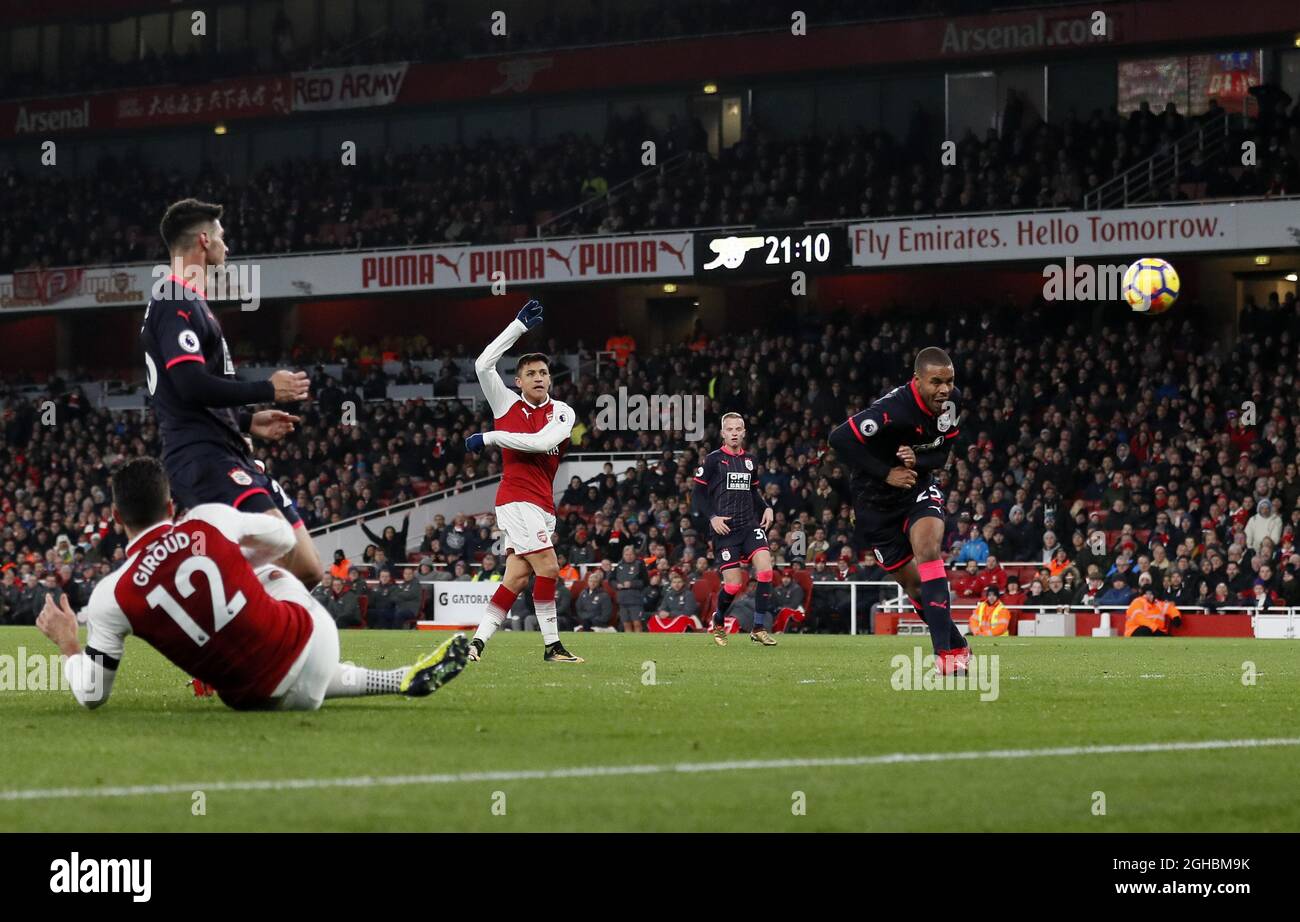 Arsenal's Alexis Sanchez scoring his sides third goal during the ...
