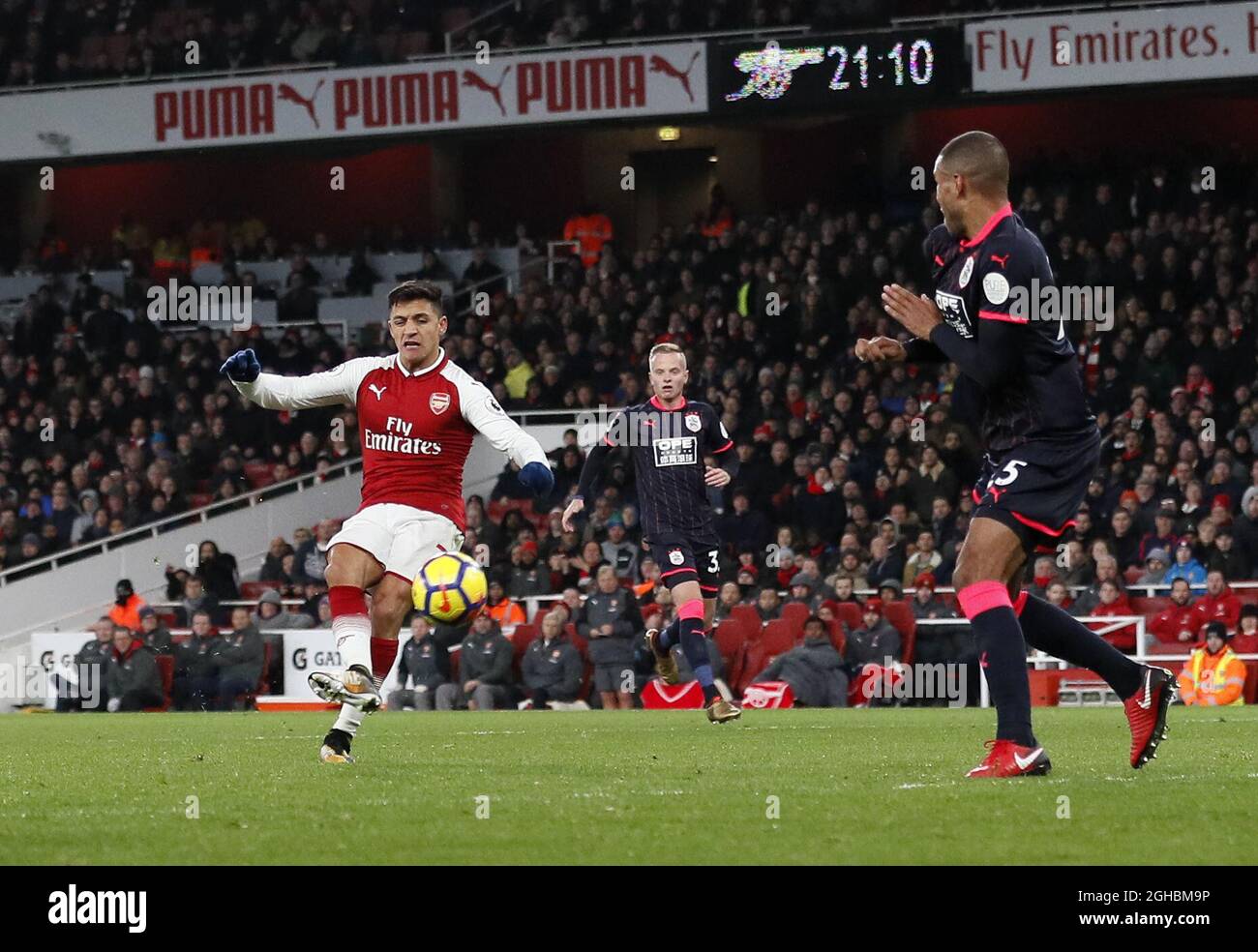 Arsenal's Alexis Sanchez scoring his sides third goal during the ...