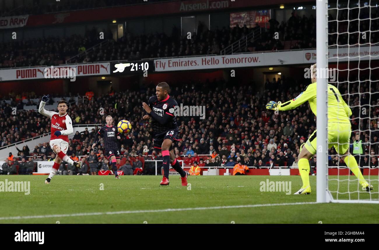 Arsenal's Alexis Sanchez scoring his sides third goal during the ...