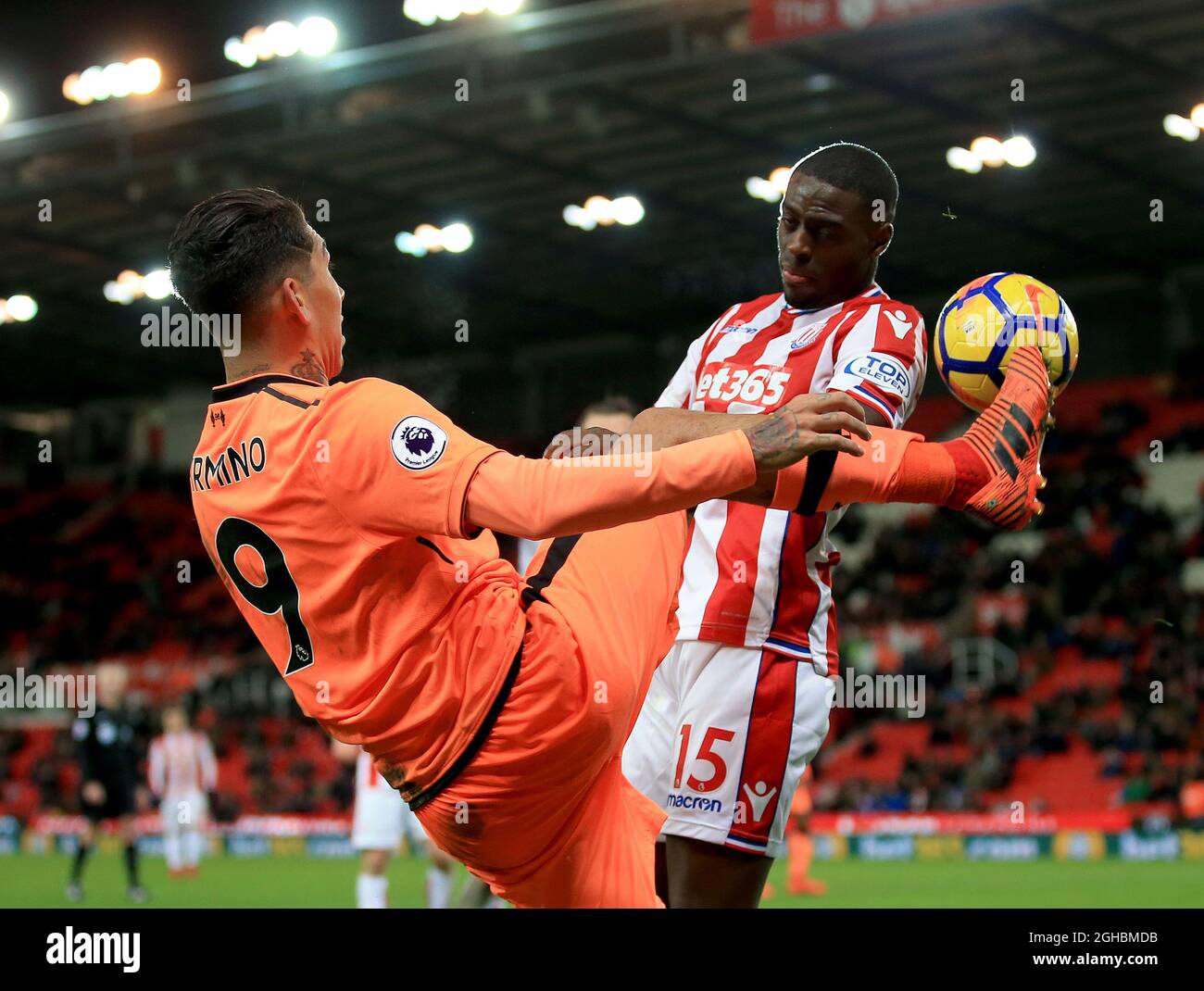Bruno Martins Indi (Right) of Stoke City tackles Roberto Firmino of ...