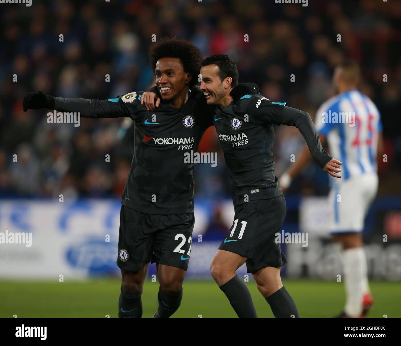 Pedro of Chelsea (r) celebrates scoring the third goal with Willian of ...