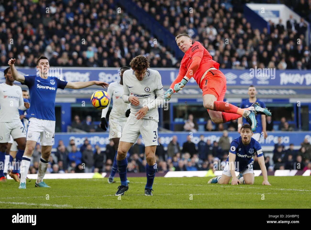 Everton's Jordan Pickford saves from Chelsea's Marcos Alonso during the ...