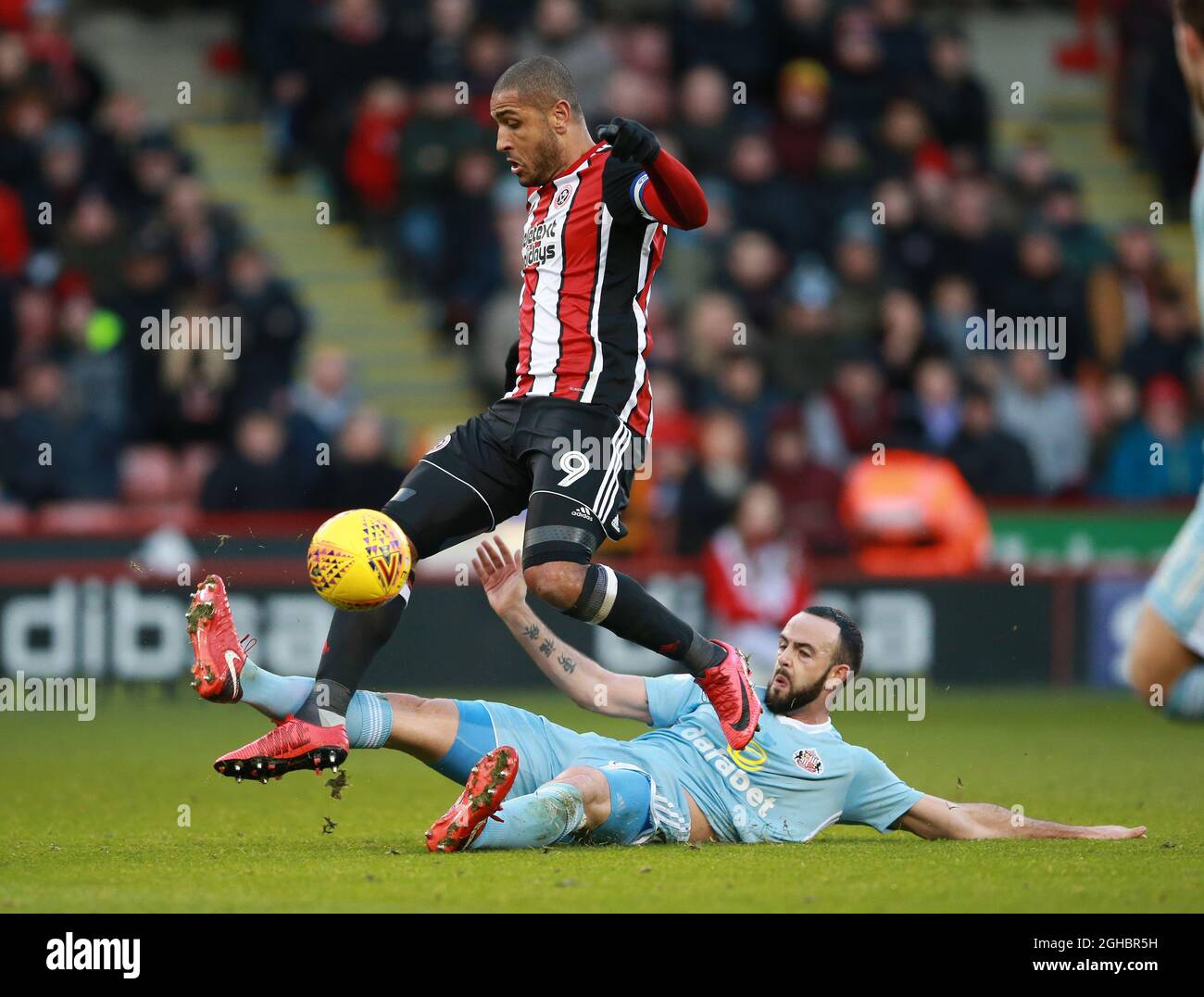 Marc Wilson of Sunderland tackles Leon Clarke of Sheffield Utd during ...