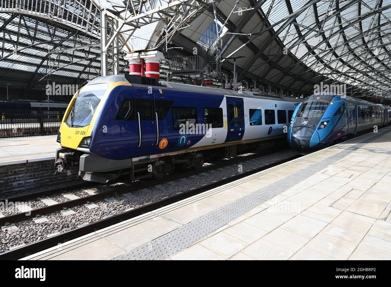 Two passenger trains at Liverpool Lime Street station in Sept 2021 ...