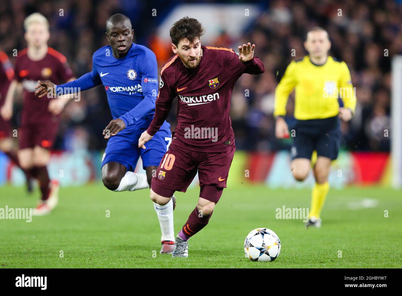 Barcelona's Lionel Messi and NÕGolo Kante of Chelsea during the ...