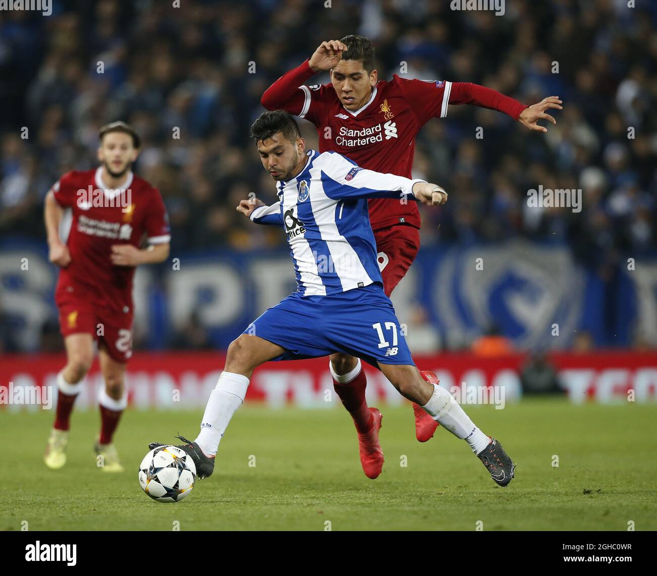 Jesus Manuel Corona of FC Porto tackled by Roberto Firmino of Liverpool ...