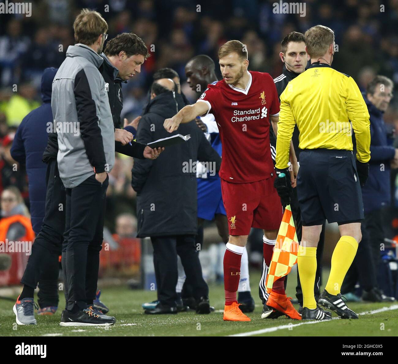 Ragnar Klavan of Liverpool receives instructions during the Champions ...