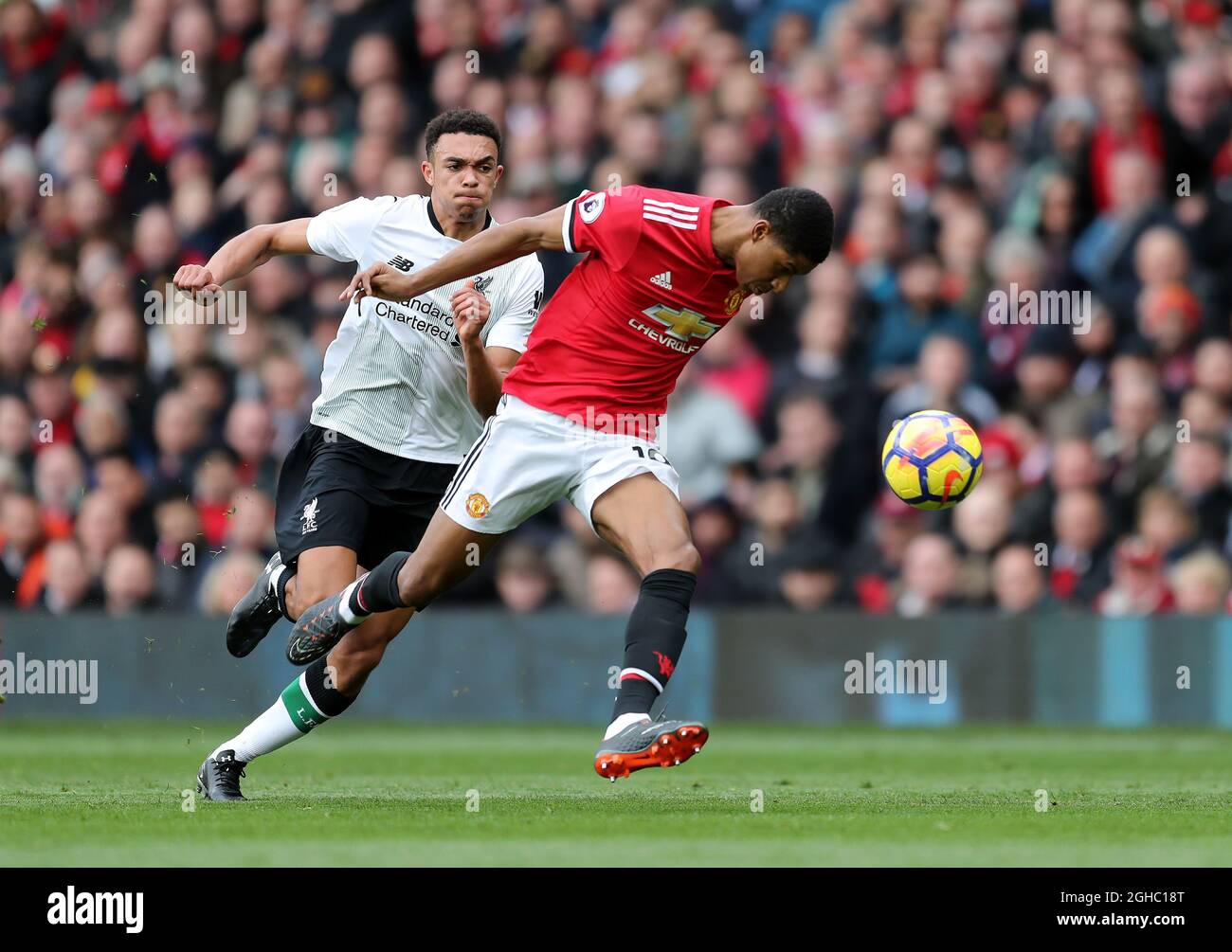 Marcus Rashford of Manchester United gets ahead of Trent Alexander ...