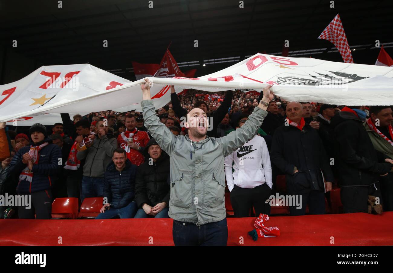 The liverpool fans cheer on their team hi-res stock photography and ...