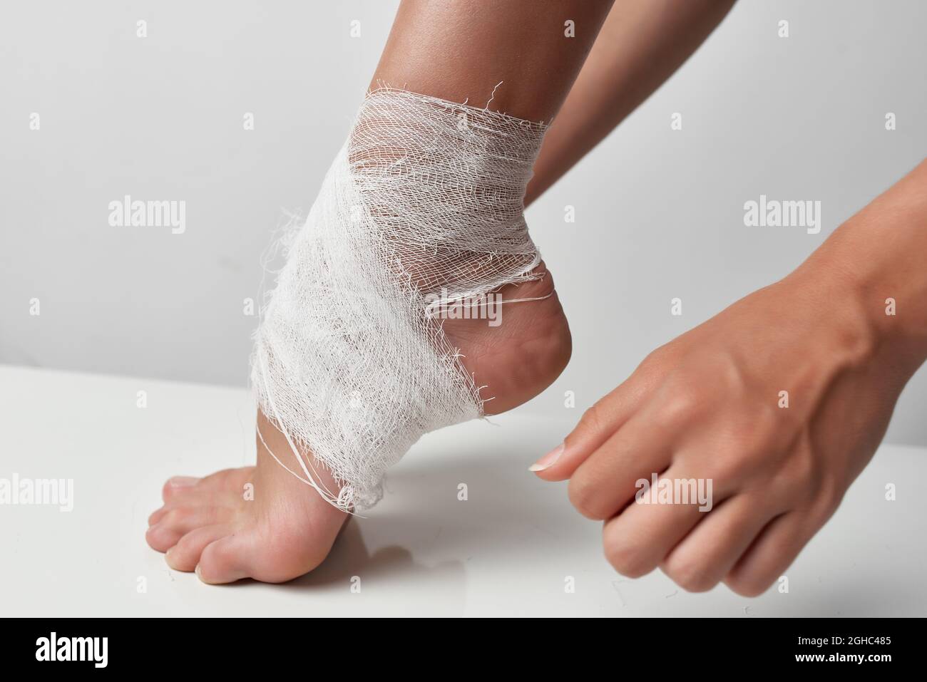 bandaged leg health problems injury medicine Stock Photo - Alamy