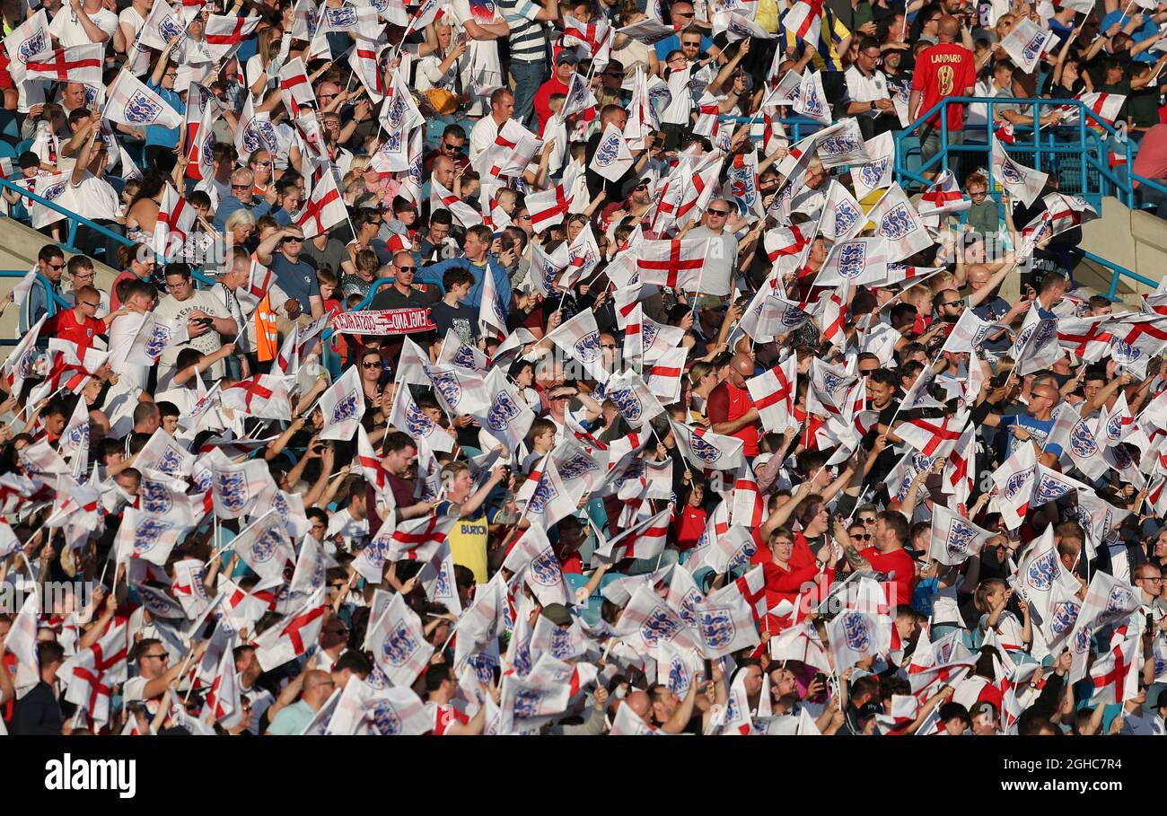 England fans wave their flags during the International Friendly match ...