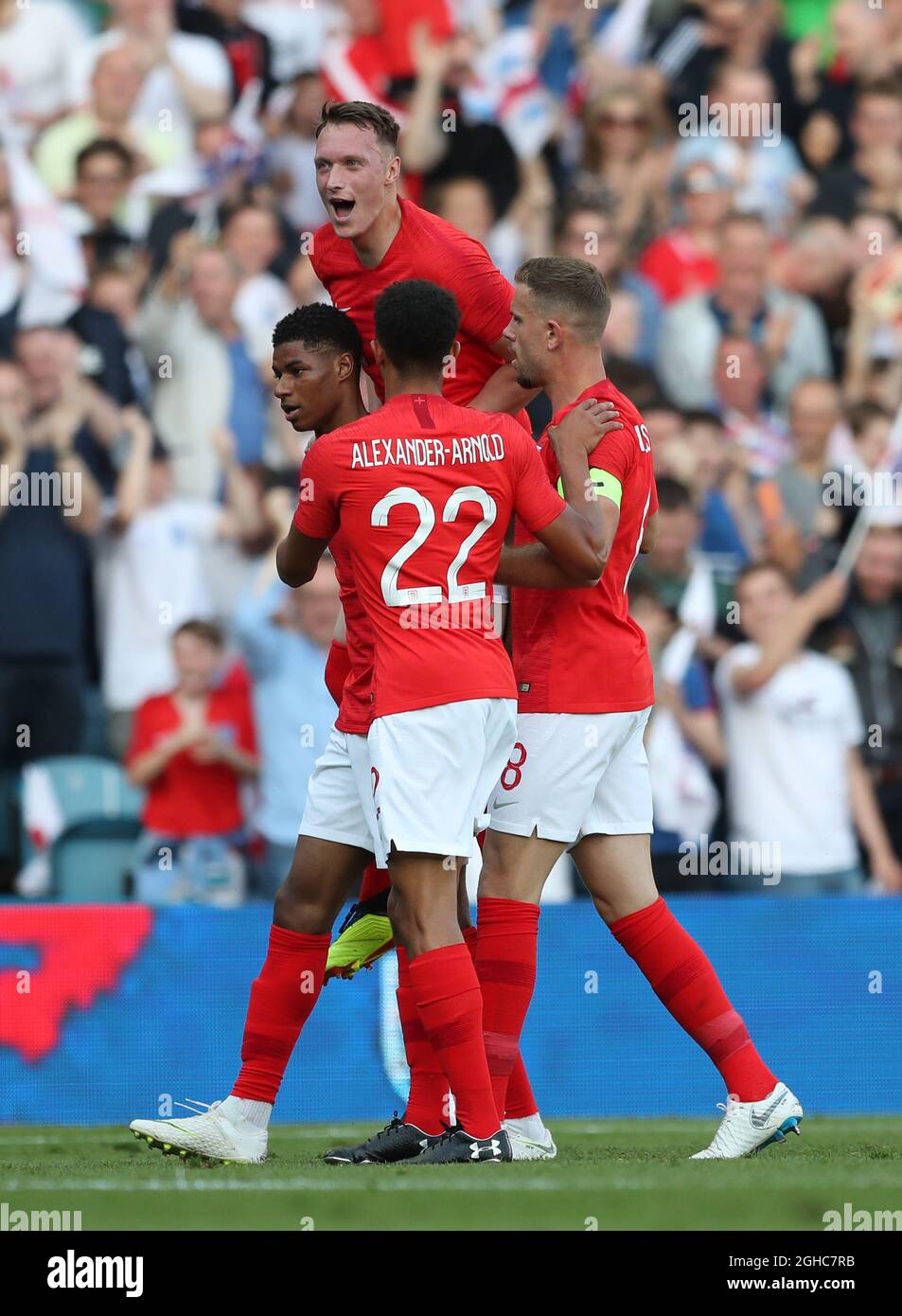 Marcus Rashford of England celebrates scoring the first goal during the ...