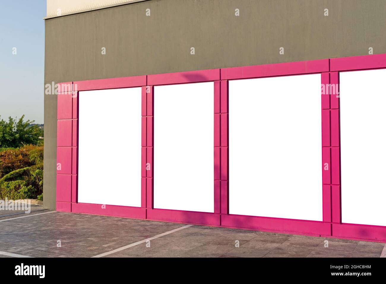 White blank billboard posters in the shop windows for advertisement ...