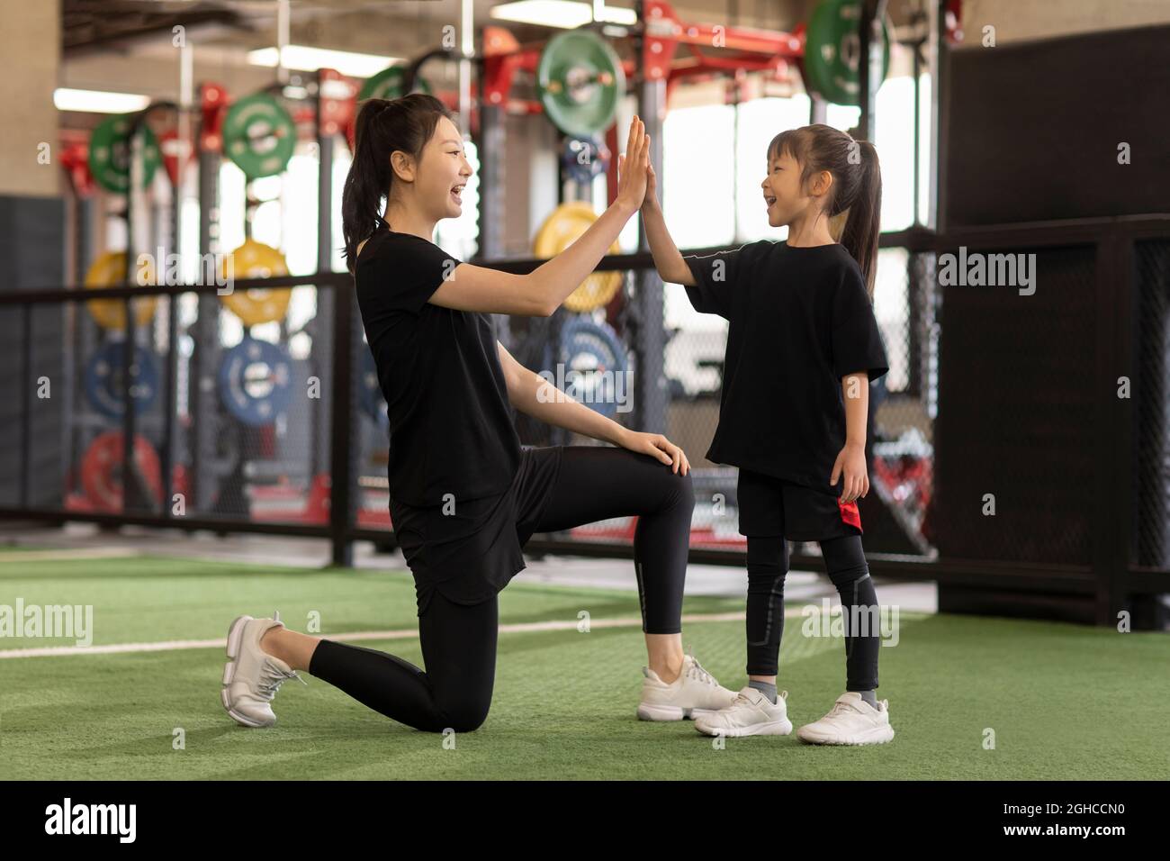 High five fiving 5 hi-res stock photography and images - Alamy